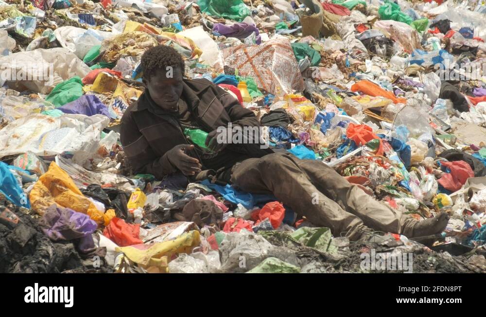 Man lying on garbage Stock Videos & Footage - HD and 4K Video Clips - Alamy
