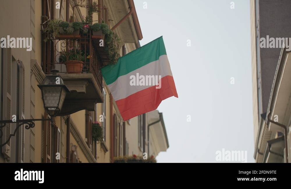 Italian Flag in a Small Town Alleyway Stock Video Footage - Alamy