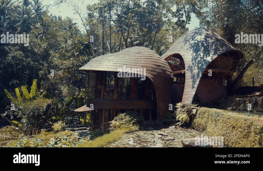 Typical balinese bamboo house inside the tropical rainforest. Magic ...