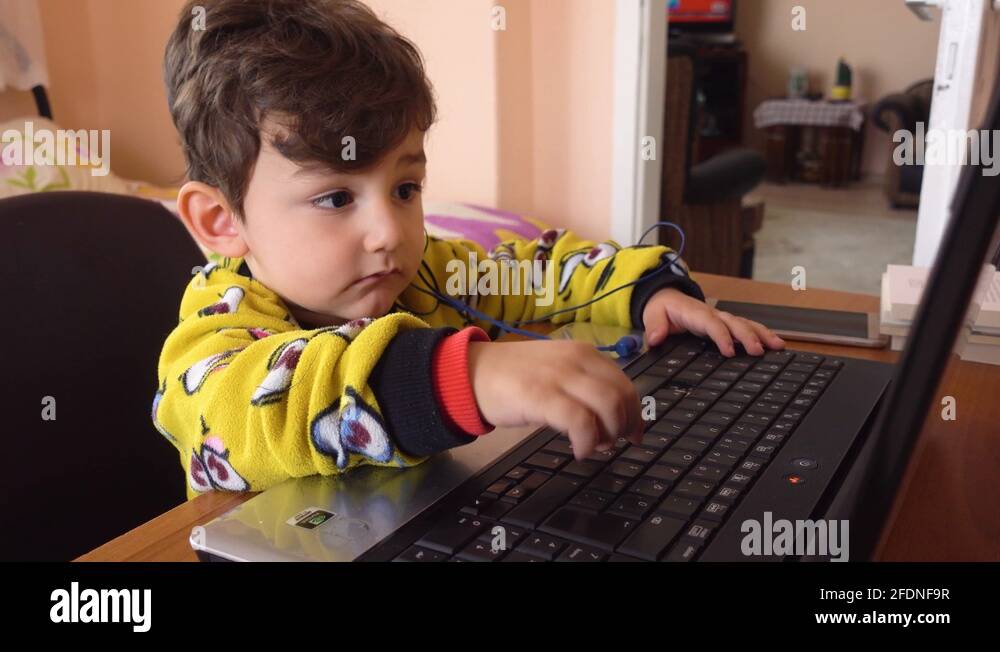Chubby kid computer Stock Videos & Footage - HD and 4K Video Clips - Alamy