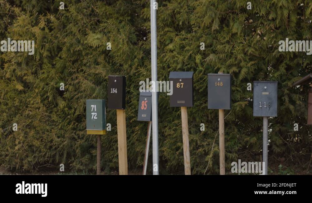 Range of letter boxes with different numbers and colours Stock Video ...