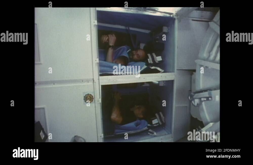 1990s: Astronauts in bunks bump their heads during orbiting maneuver ...