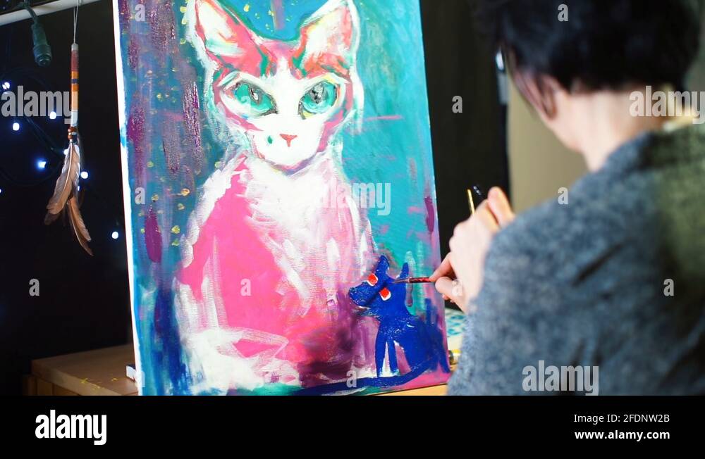 A woman makes a video tutorial about drawing a house in self-isolation ...