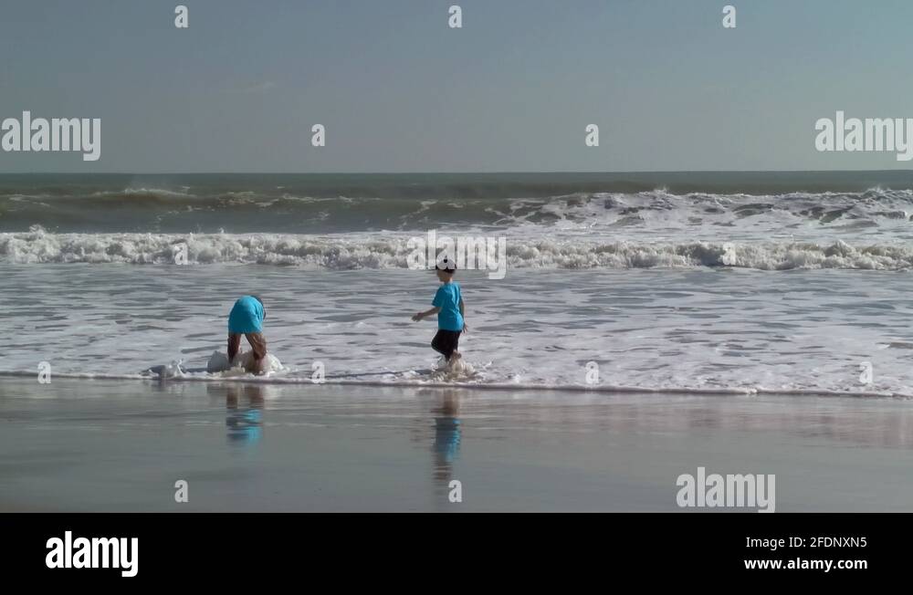 Boys in ocean Stock Videos & Footage - HD and 4K Video Clips - Alamy