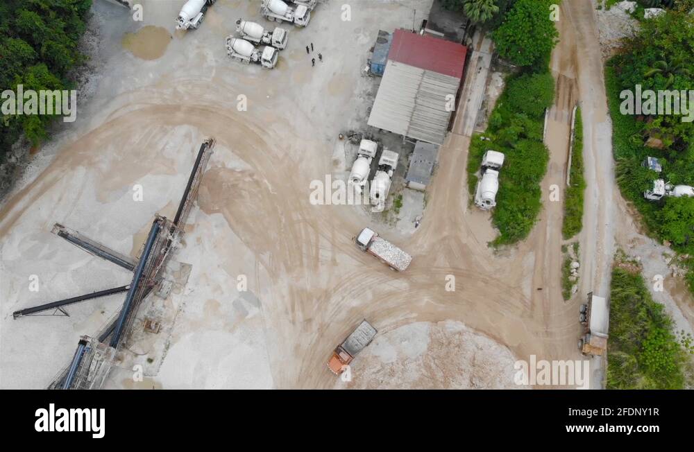 loaded lorry and empty lorry on a construction site top view- dolly ...