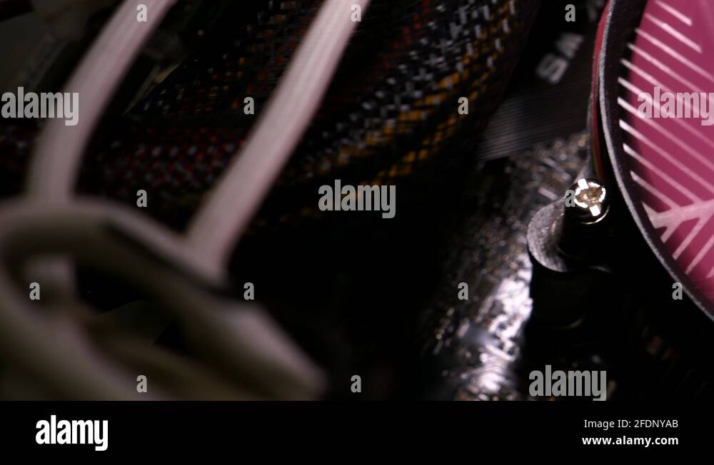 The Pink Processor Cooler On The Motherboard Is Spinning In Computer ...