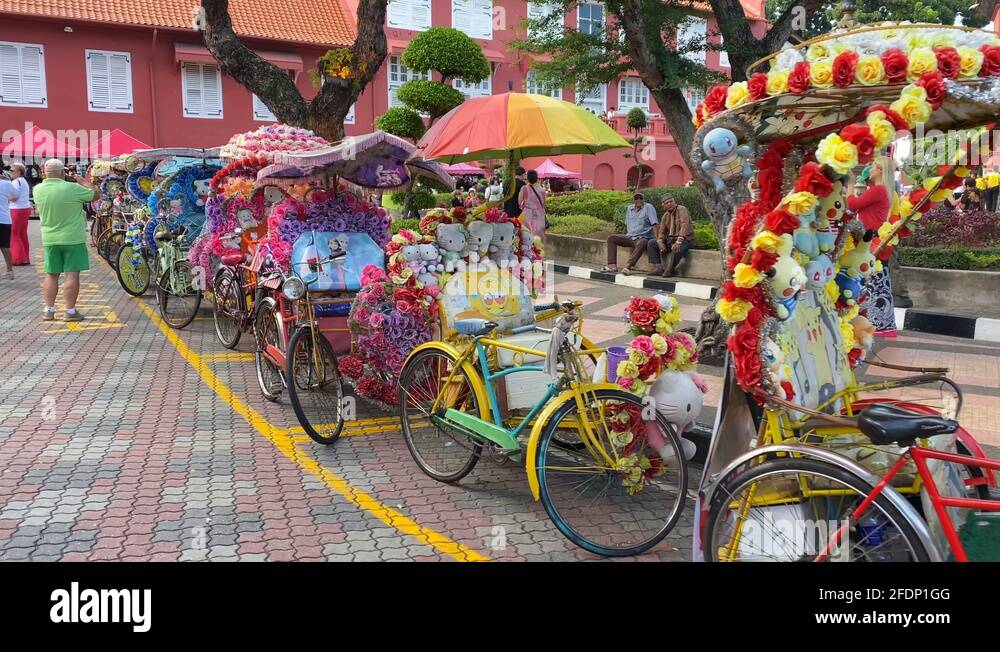 Colorfull Flowered Tuk Tuk Aligned At Dutch Square In Malacca Malaysia