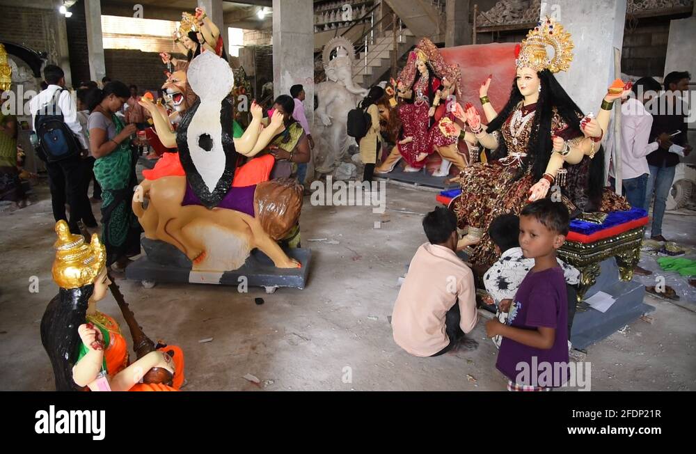 The artist making sculptures of the Hindu goddess Durga Stock Video ...