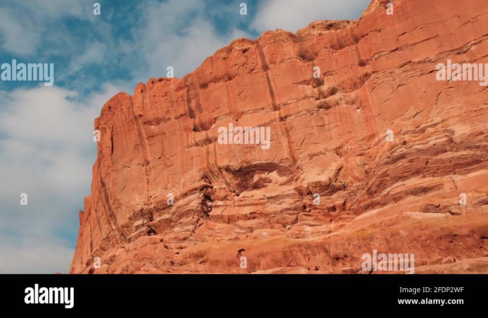 Top down view of massive red rock monolith on bright sunny day ...