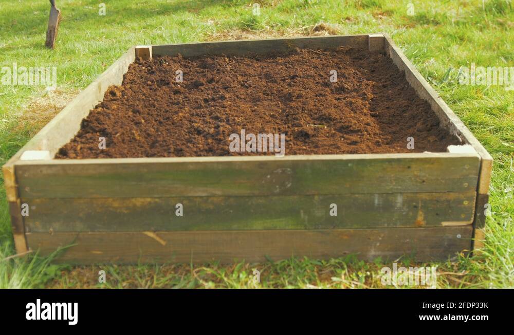 Raised bed compost Stock Videos & Footage - HD and 4K Video Clips - Alamy