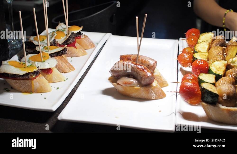 Tapas traditional Spanish sandwiches starters in a cafe in Barcelona ...