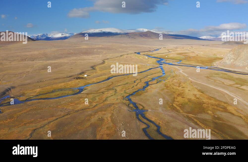 Mongolian Steppe grasslands with spring-water rivers in Altai Mountains ...