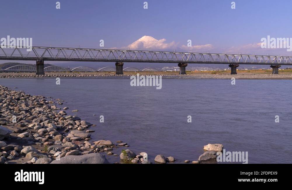 The famous Shinkansen bullet train in Japan crossing the Fujikawa ...