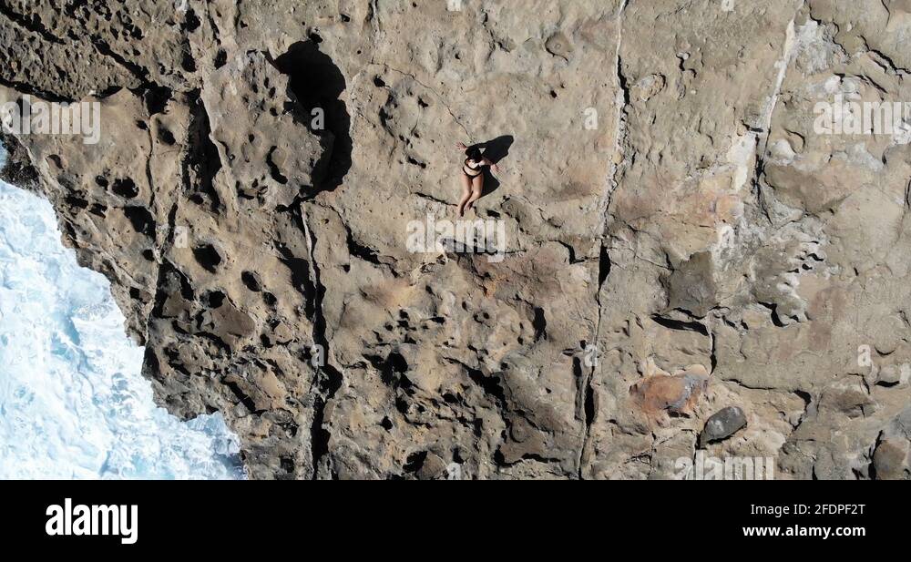 Woman lying down cliff Stock Videos & Footage - HD and 4K Video Clips ...