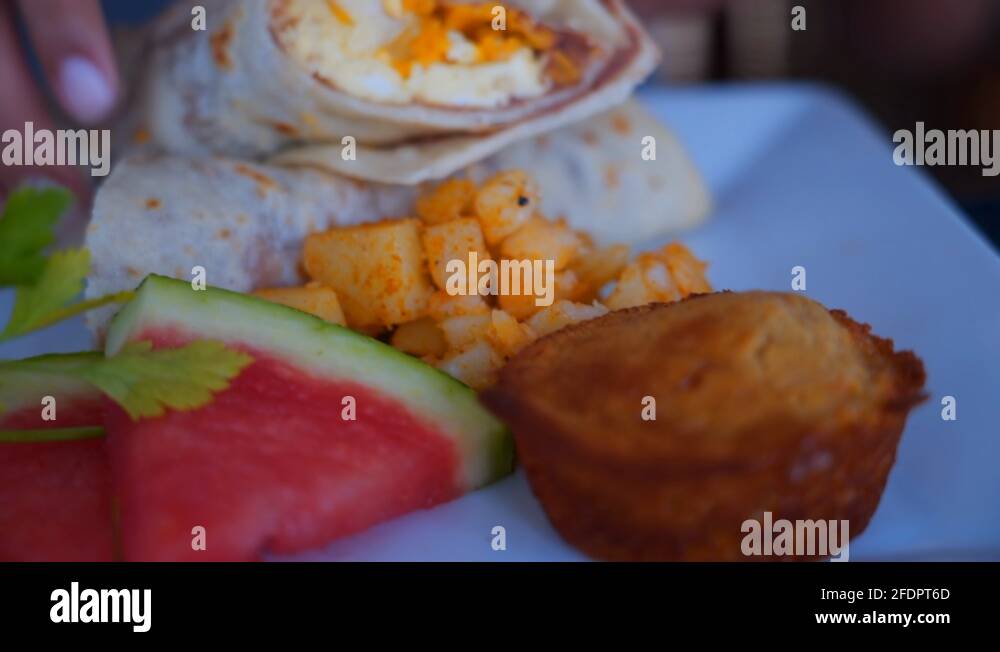 Woman eating wrap Stock Videos & Footage - HD and 4K Video Clips - Alamy