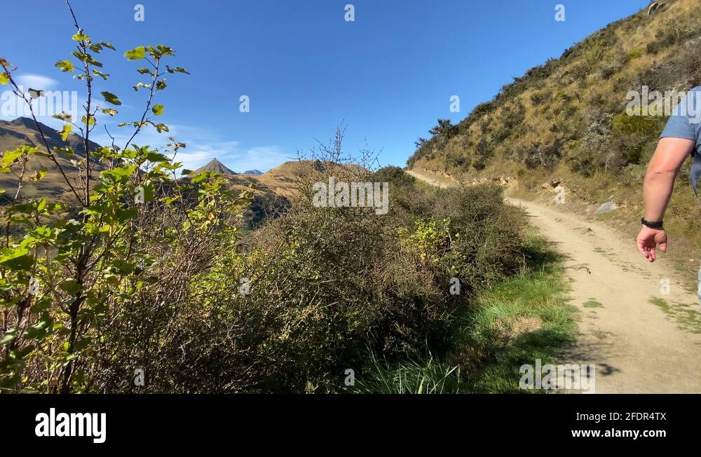 Woman walking along trail Stock Videos & Footage - HD and 4K Video ...