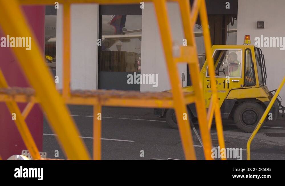 Yellow Freight Trolley Stock Video Footage - Alamy