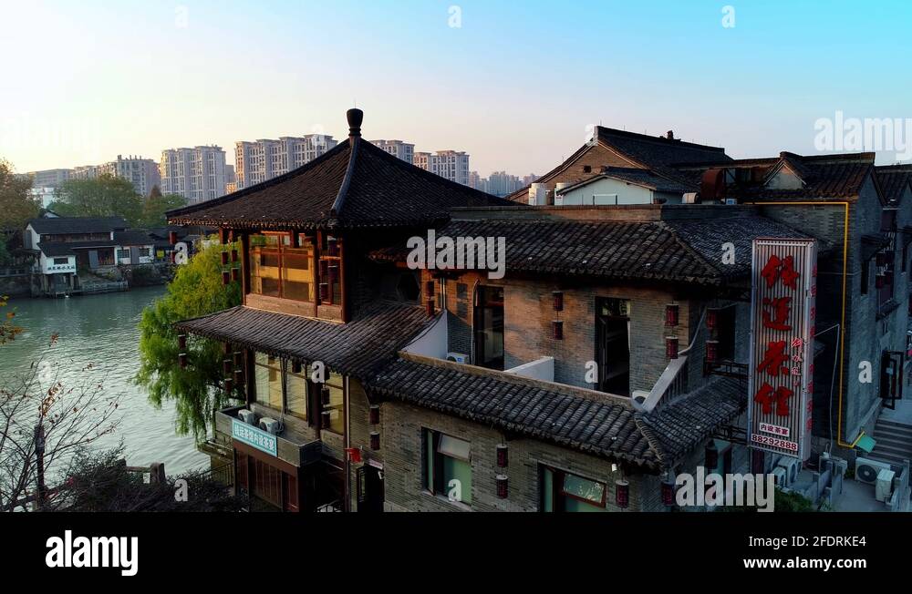 Chinese water town. Ancient buildings, arch bridge. Aerial view of city ...