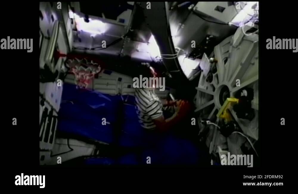 1990s: astronaut in zero gravity does a spinning behind the head dunk ...