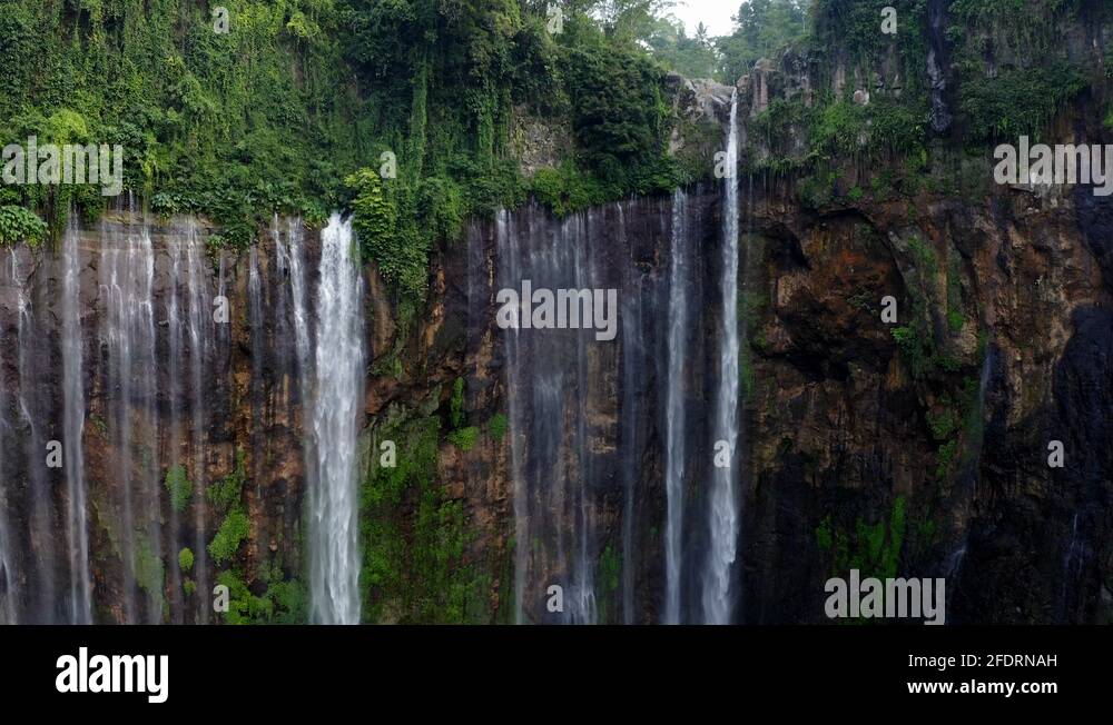 Tumpak Sewu Waterfall, water cascading down tall East Java Falls Stock ...