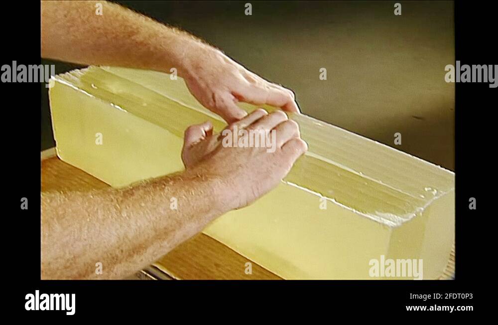 1990s: Person peels block of ballistic gelatin in half and pulls bullet ...