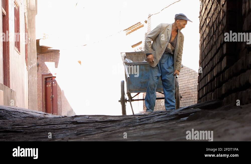 Man pulling hand cart in Stock Videos & Footage - HD and 4K Video Clips ...