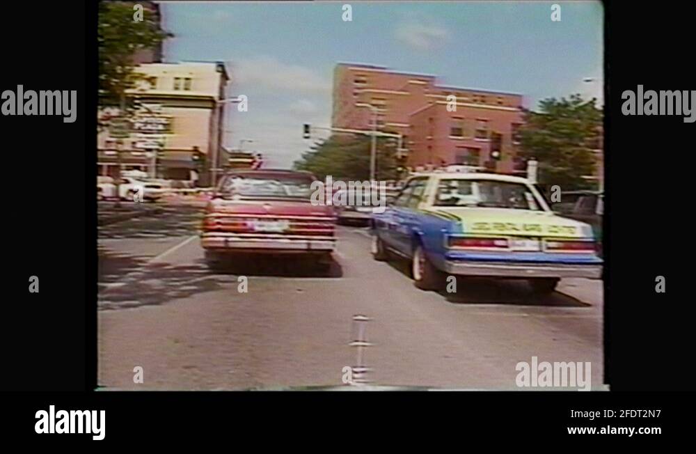 1990s: Flashing arrow sign is high enough to be visible above turning ...