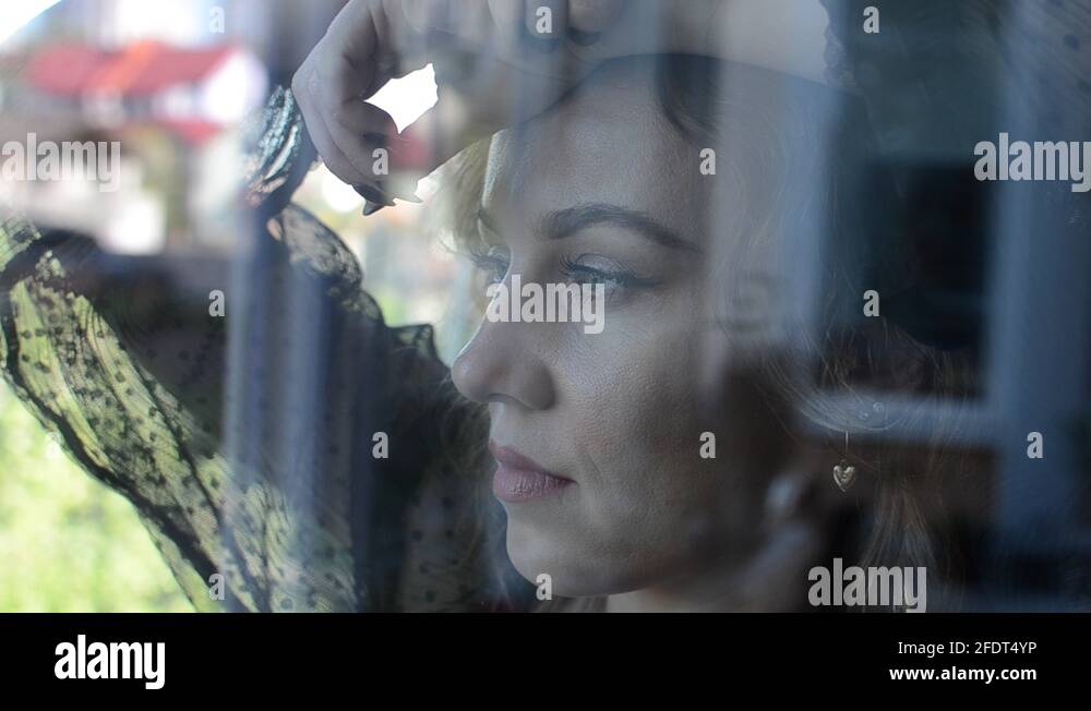 Young woman through window Stock Videos & Footage - HD and 4K Video ...