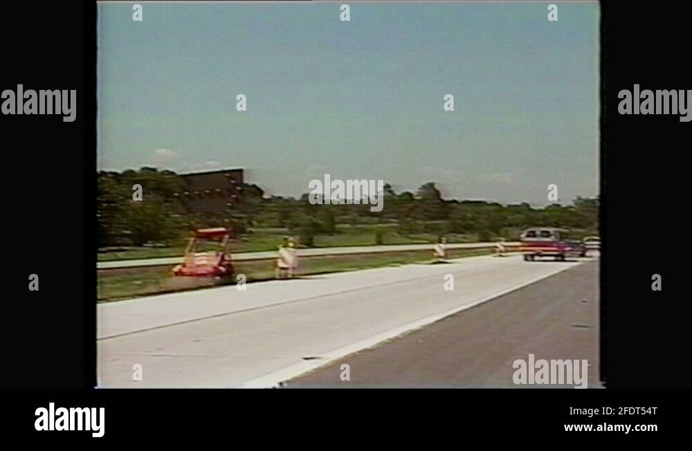1990s: Flashing arrow light on the highway shoulder. Right flashing ...
