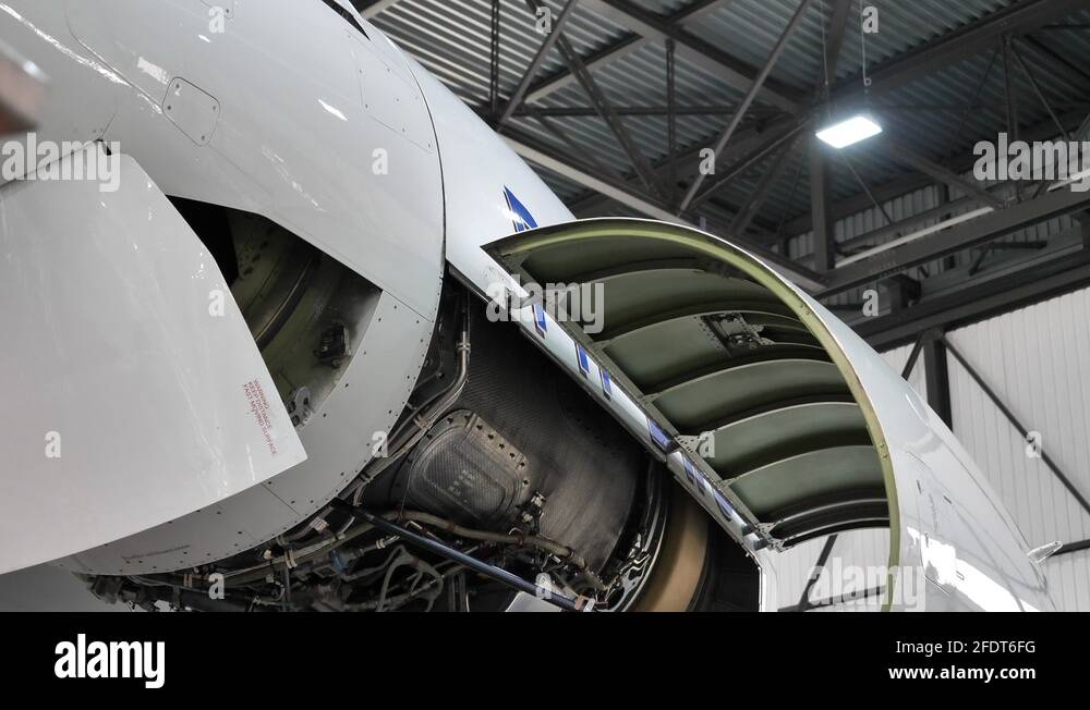 Close Up Open Aircraft Jet Engine in Maintenance Facility. Tilt Down ...