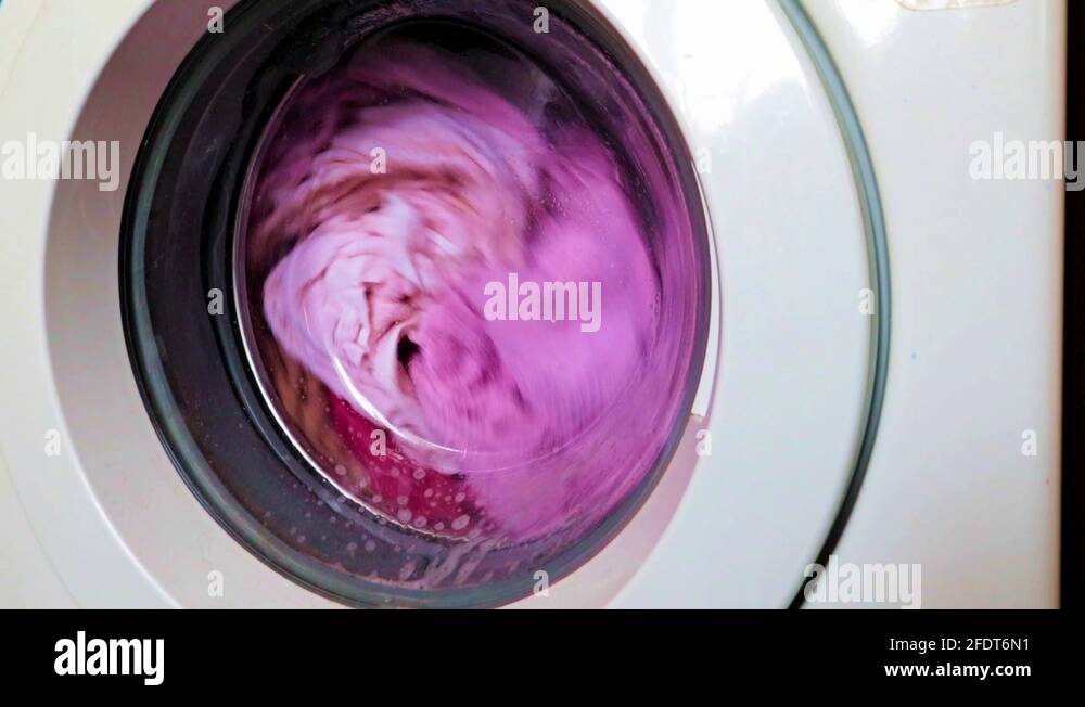 rotation of the washing machine drum Stock Video Footage - Alamy