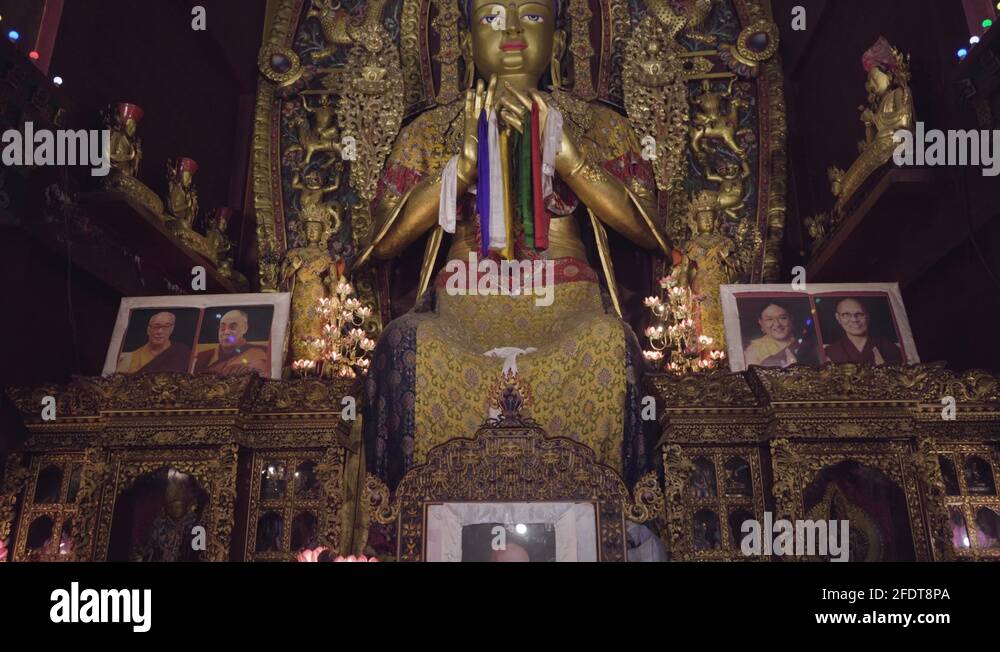 Great Statues Of Lord Buddha And Monks Inside The Buddhist Temple Stock ...