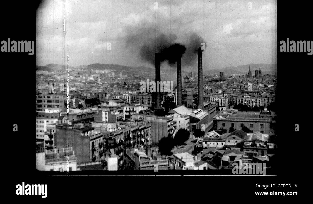1960s: factory stacks billowing smoke in cities, cars crowding street ...