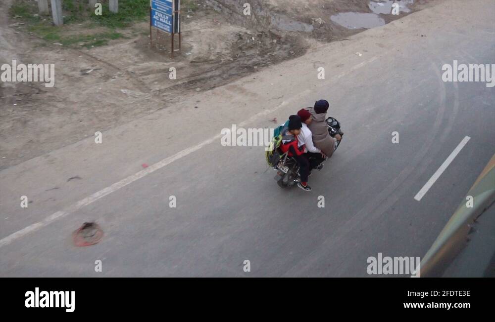 Man driving overloaded motorcycle Stock Videos & Footage - HD and 4K ...