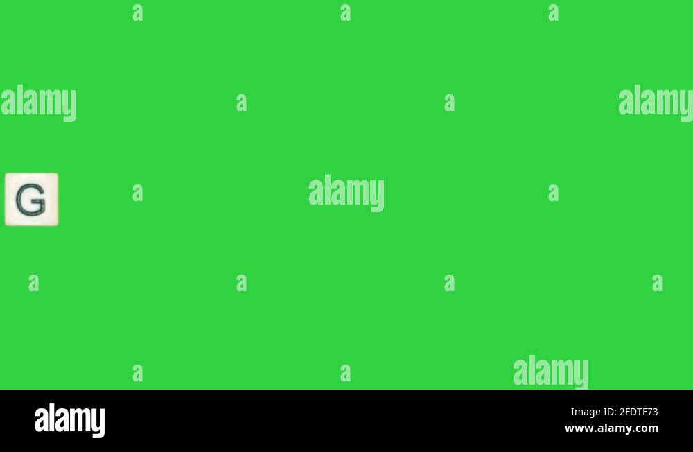 Letter G scrabble slide from left to right side on green screen, letter ...