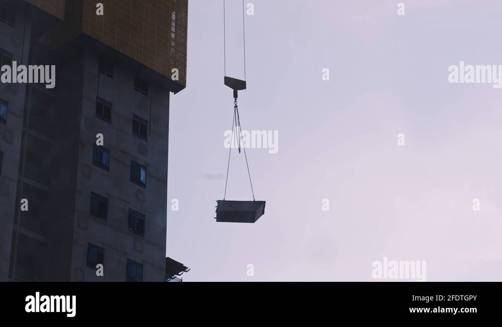 Hoisting tower crane Stock Videos & Footage - HD and 4K Video Clips - Alamy