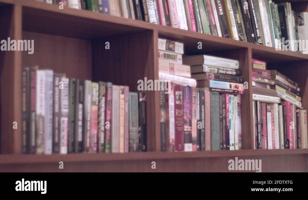 Bookshelf collection Stock Videos & Footage - HD and 4K Video Clips - Alamy