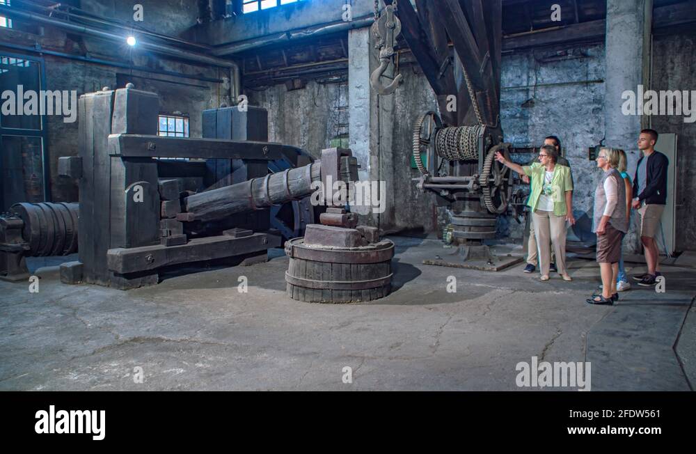 tour group visit old ironmaking factory shop floor. Ravne na Koroskem ...