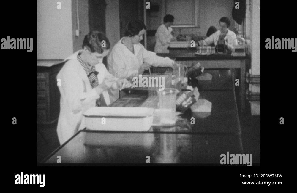 1950s: Women test blood samples in laboratory. Scientists place antigen ...