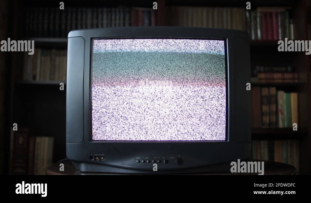 Vintage television displaying static noise on screen, retro ...