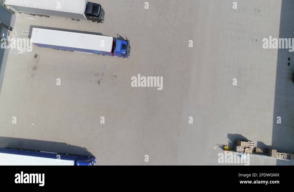 Container Trucks Parked At The Loading Bay Of A Warehouse In Kowale ...