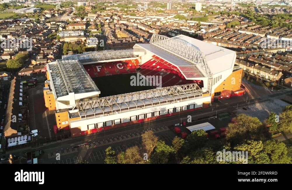 Iconic Liverpool LFC Anfield stadium football ground aerial view slow ...