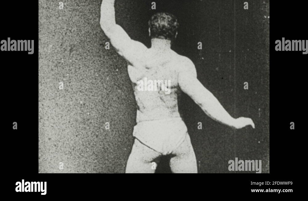 Muscles flexing pose Stock Videos & Footage - HD and 4K Video Clips - Alamy