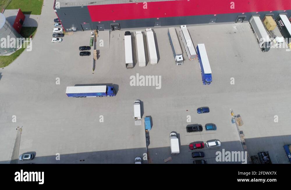 Trailer Trucks At The Loading Area Of A Logistic Warehouse In Kowale ...