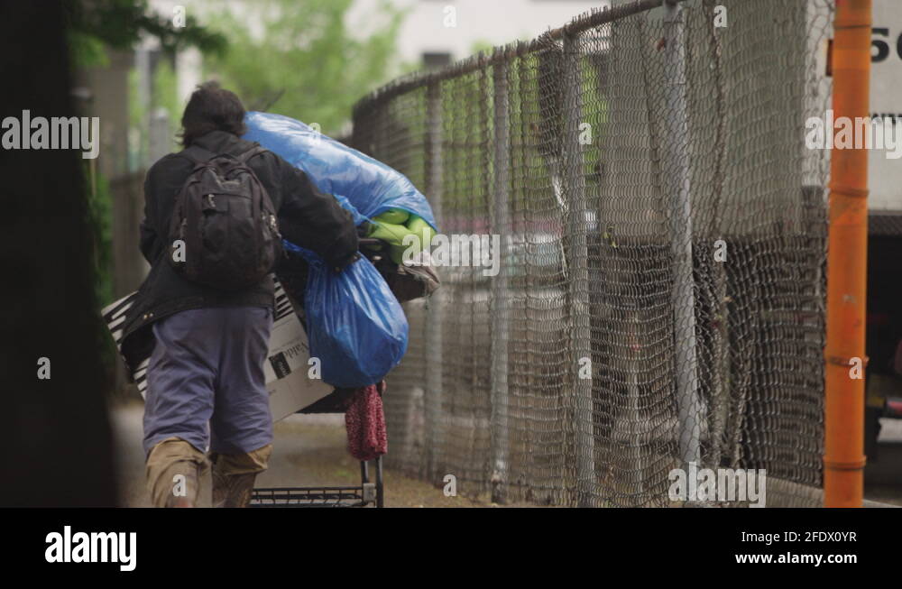 Homeless man pushing shopping cart Stock Videos & Footage - HD and 4K ...