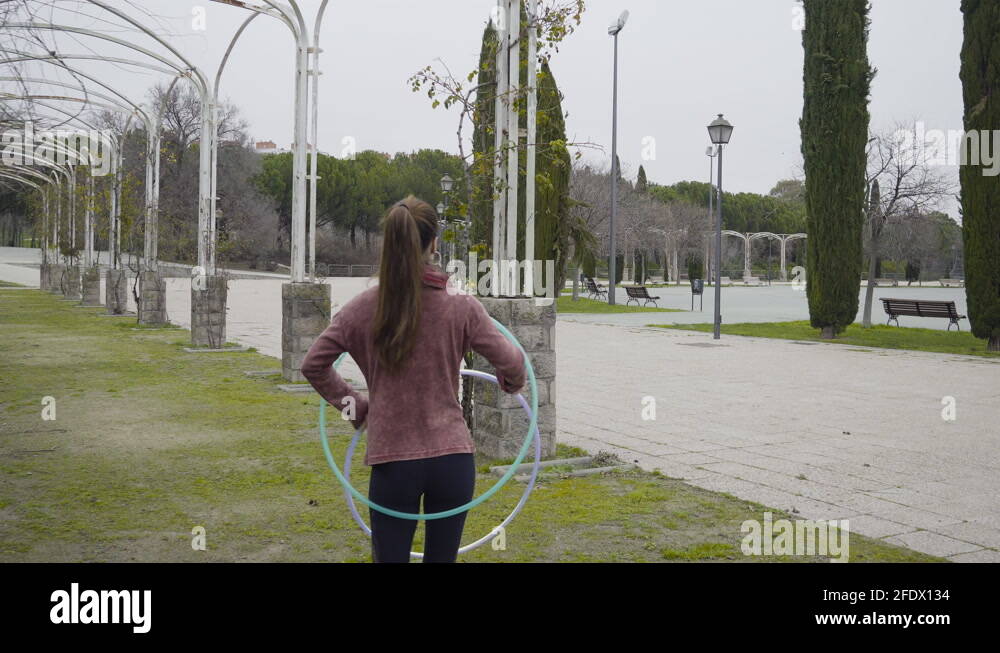 Two Generation Z women playing with Hula Hoop rings Stock Video Footage ...