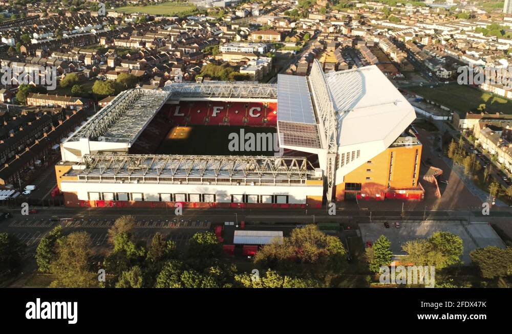 Iconic Liverpool LFC Anfield stadium football ground aerial orbit right ...
