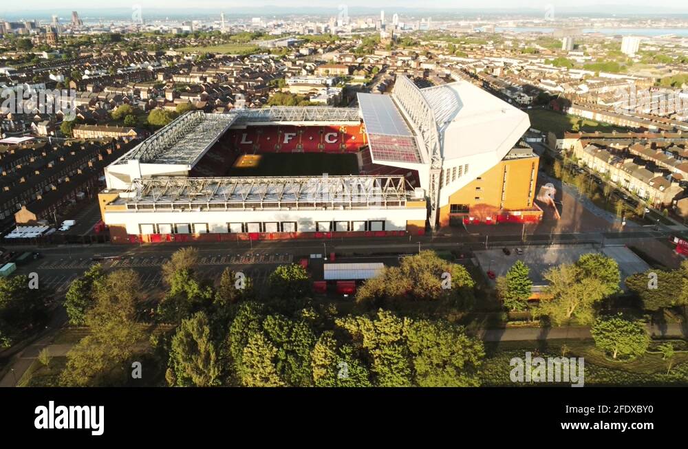 Iconic Liverpool Anfield LFC stadium football ground aerial push in ...