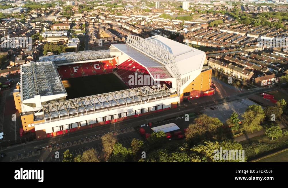 Iconic Liverpool LFC Anfield stadium football ground aerial view dolly ...