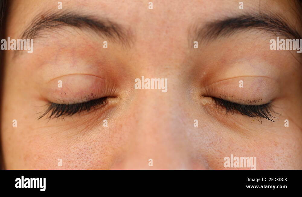 Woman shock reaction face close-up macro eyes wide open Stock Video ...